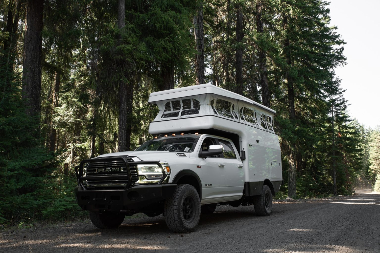 GMC Teams Up With EarthCruiser for HUMMER EV Overland Conversion | GM ...